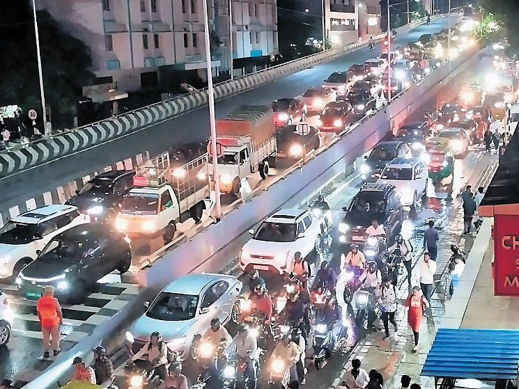 Scooter rider escapes after falling into open manhole during Bengaluru ...