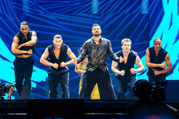 Ricky Martin rushed off stage at concert after tear gas was released