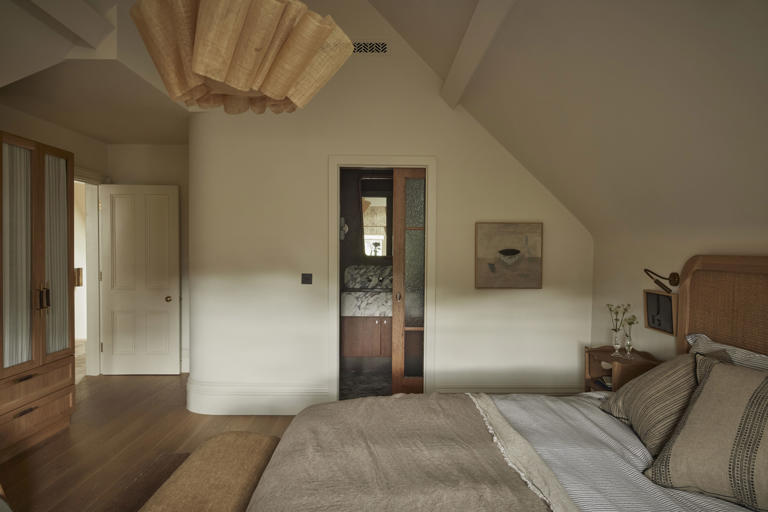 A 'Scandi-inspired retreat' is hidden within the loft of this London home