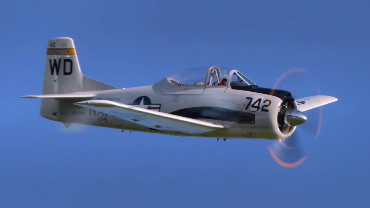 Watch this warbird roar inches above the runway - "The sound hits like ...