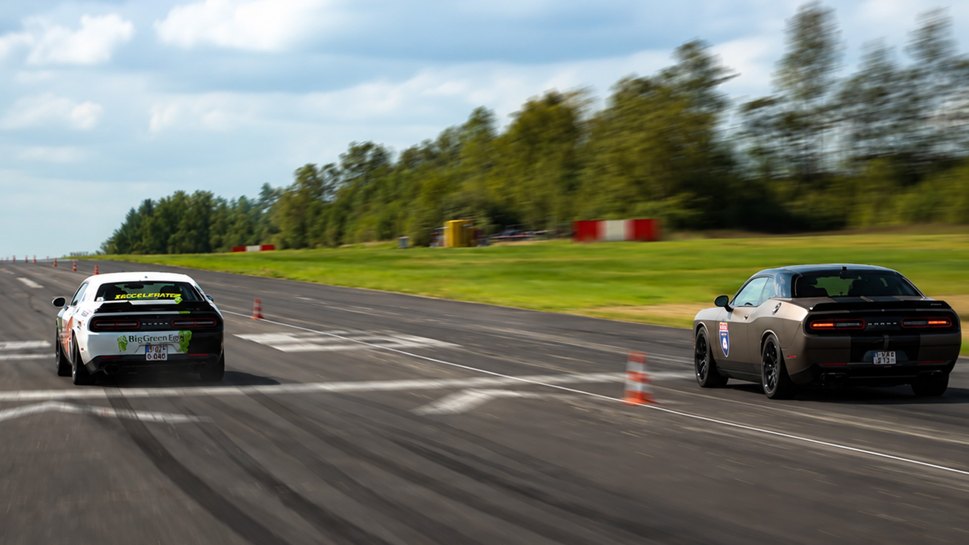 When two muscle cars meet in a drag race