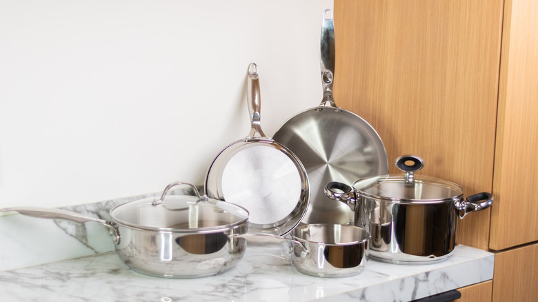 Stop stuffing your cabinets: A smarter way to store pots and pans ...