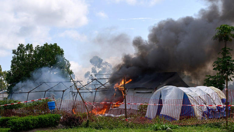 Ebola treatment center set on fire in Congo after residents clash with ...