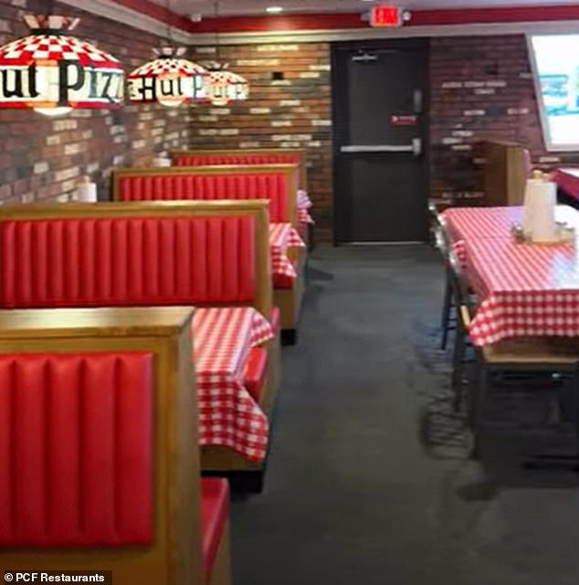 Inside Pizza Hut frozen in the 90s with buffet, arcade and checkered tables