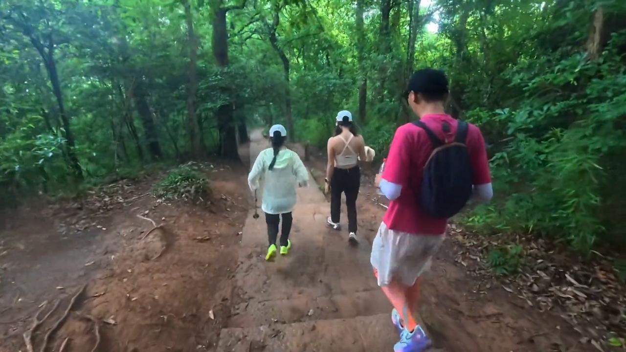 Woman takes a tumble running down mountain stairs