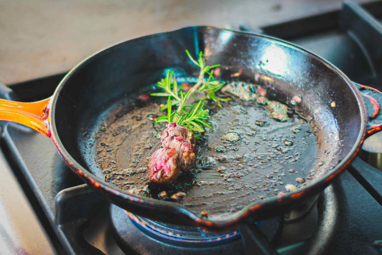 How to clean a cast iron skillet after cooking with this $3 Lodge tool