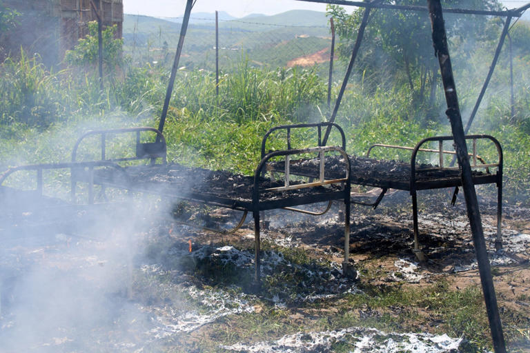 Ebola patients who fled hospital set on fire by families now avoiding ...