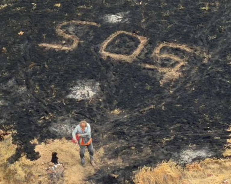 Sailor’s SOS flare set fire to a quarter of an island that is still ...