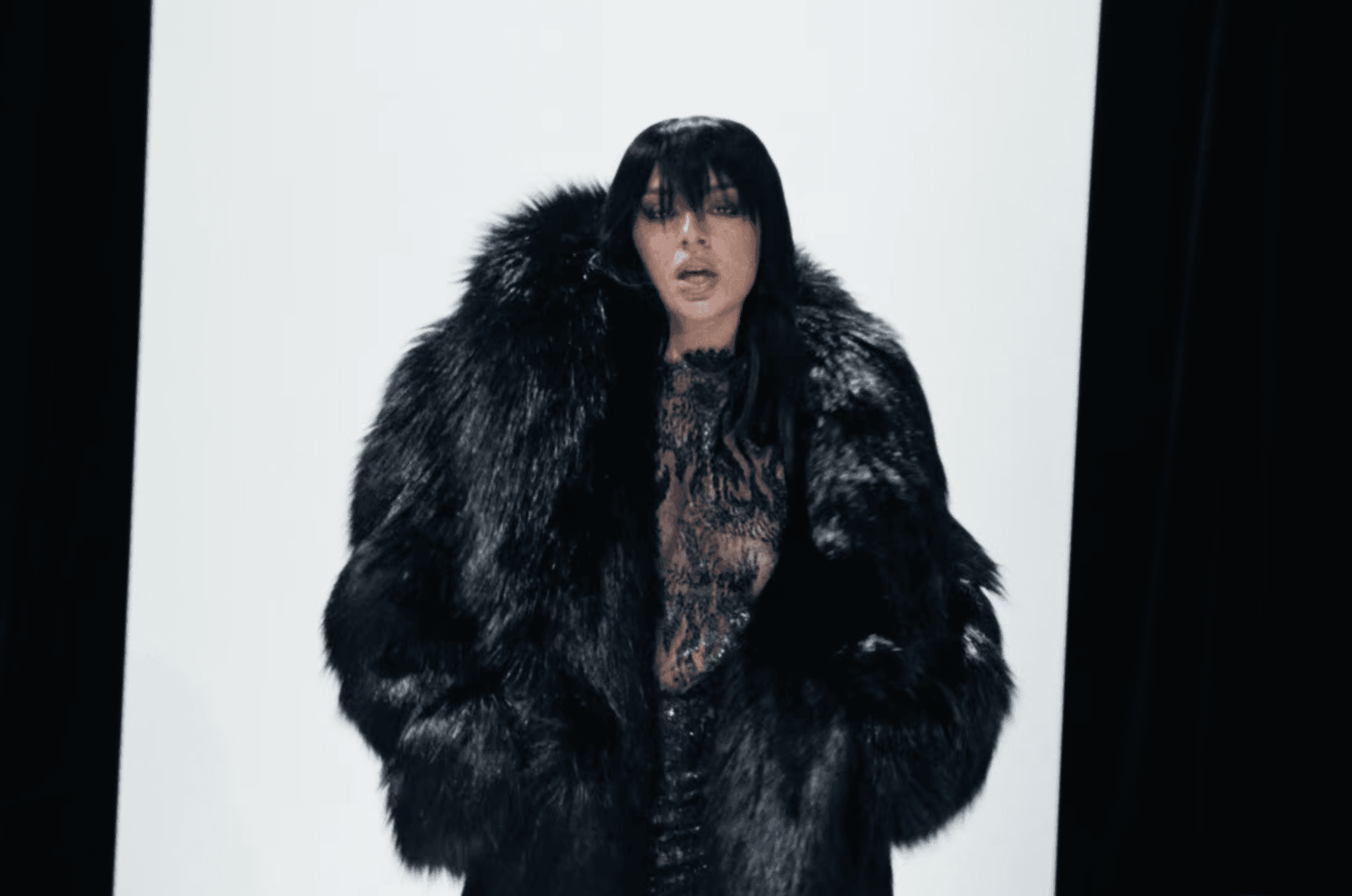 Blink and you'll miss Charli XCX with extra-long bangs