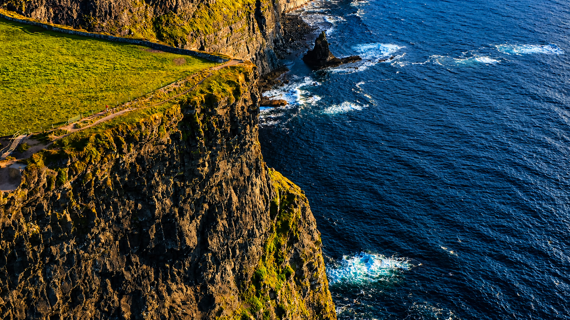 Panoramic aerial landscape of cliffs and blue sea