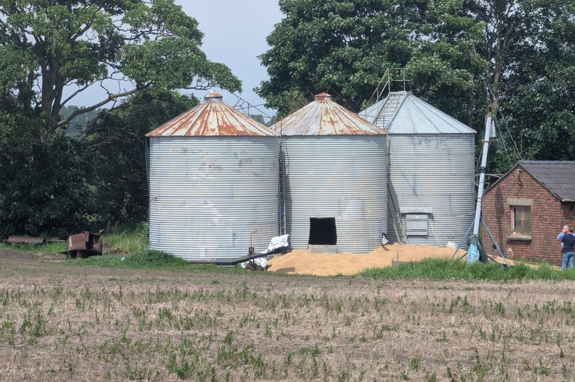 Man falls to his death as firefighters forced to cut open silo