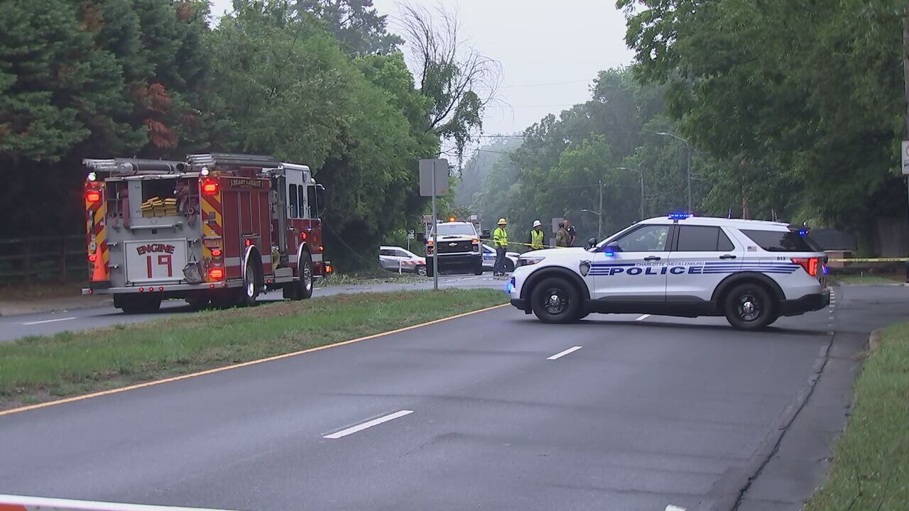 South Charlotte roadway blocked after crash downs power lines