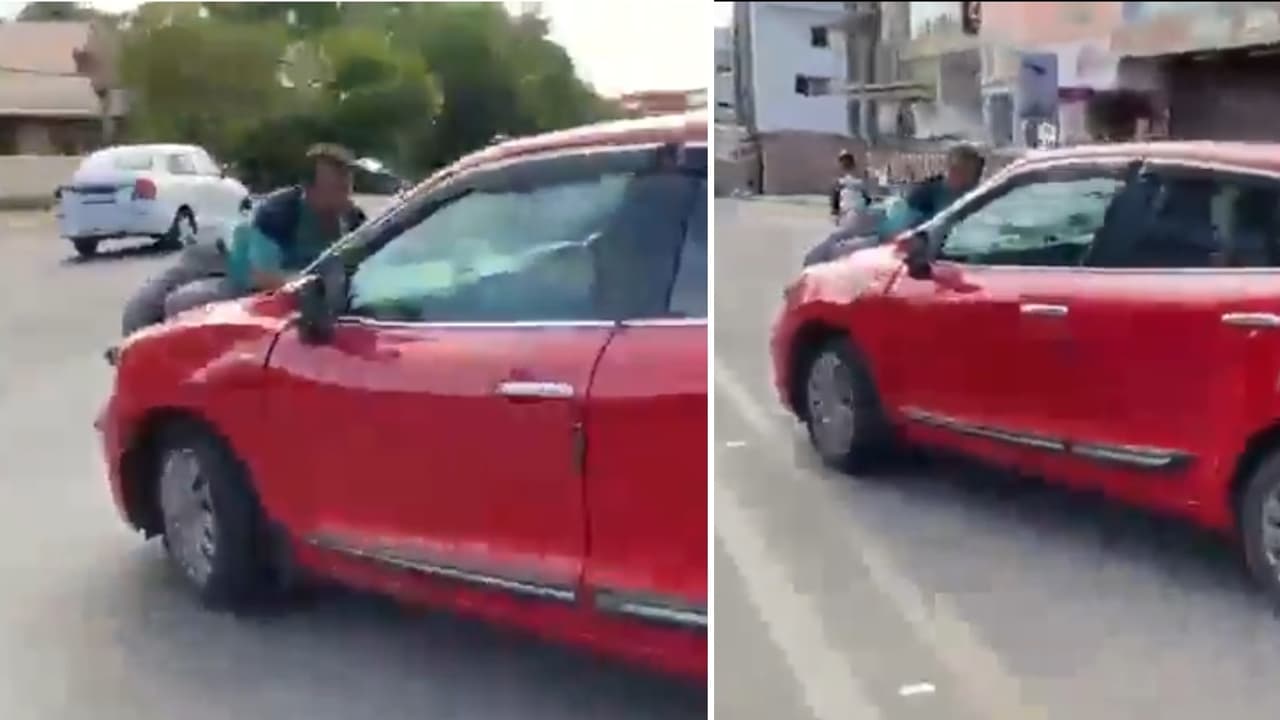 Caught on camera: Man dragged 500 metres on car bonnet over alleged ...