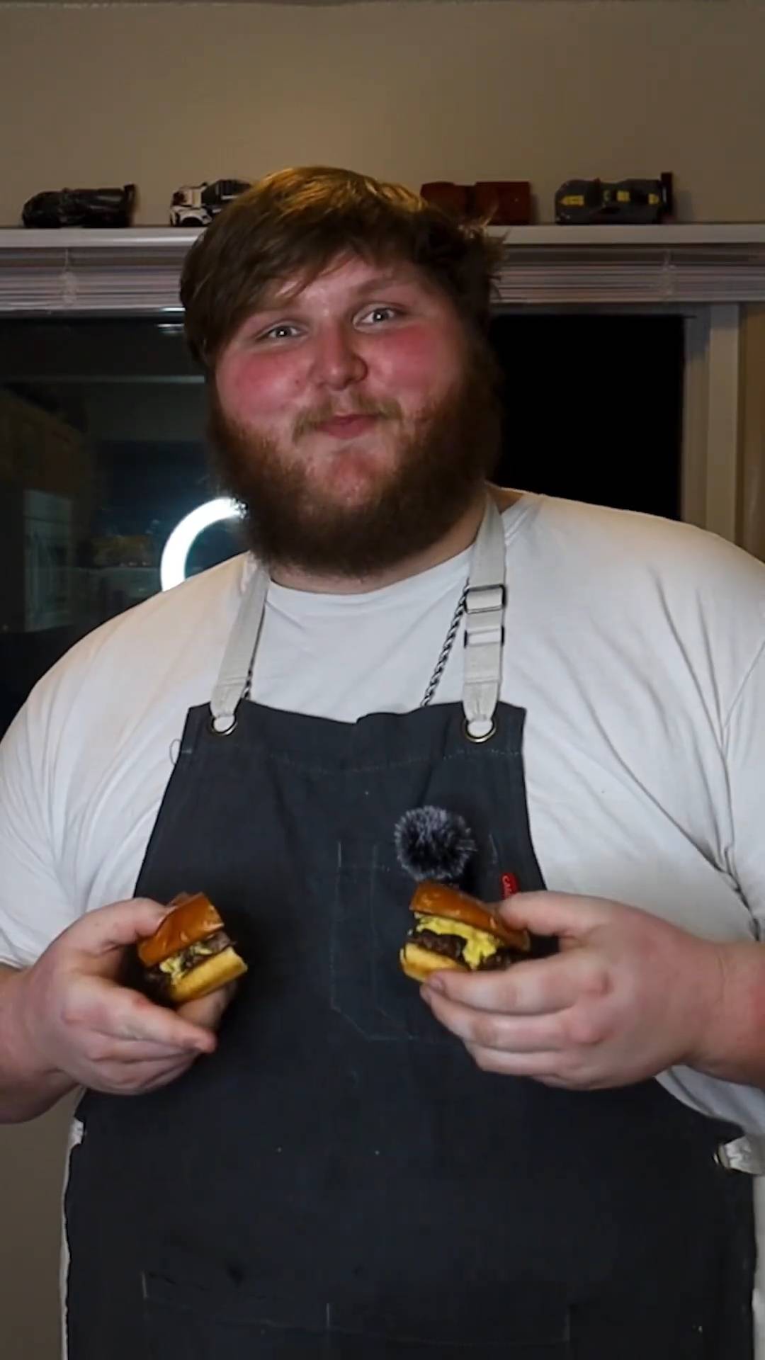 Cheese-stuffed burgers with melted American cheese oozing from the center