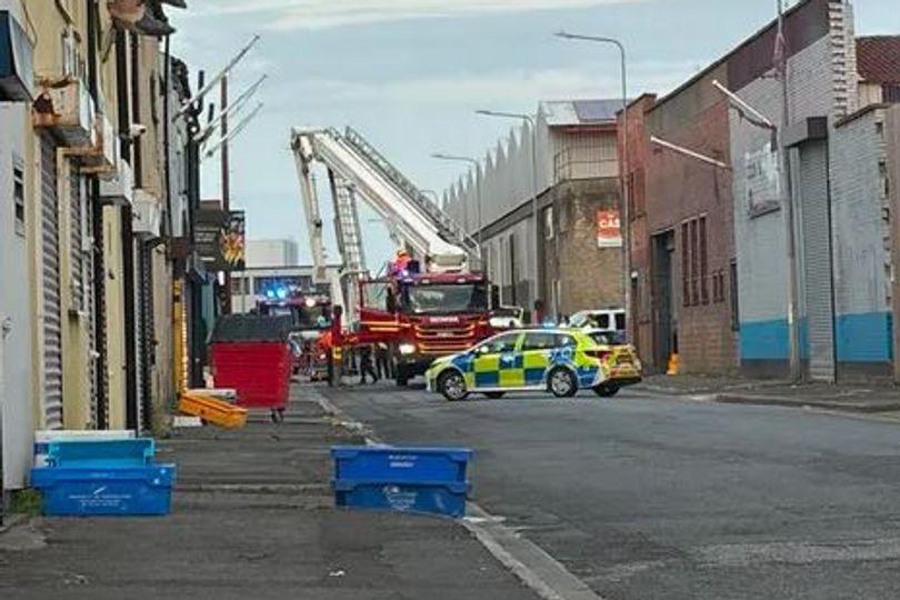 Scene guard in place after officers find cannabis grow in Grimsby warehouse