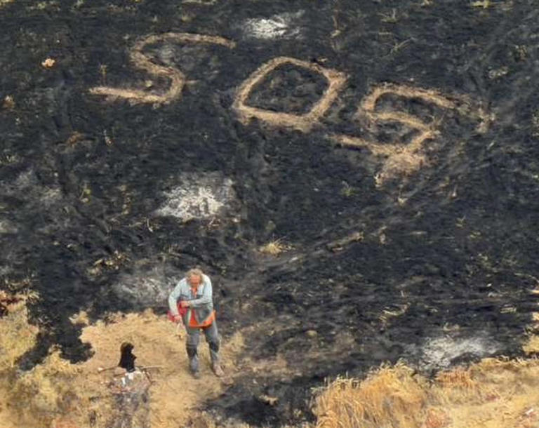 Sailor’s SOS flare set fire to a quarter of an island that is still ...