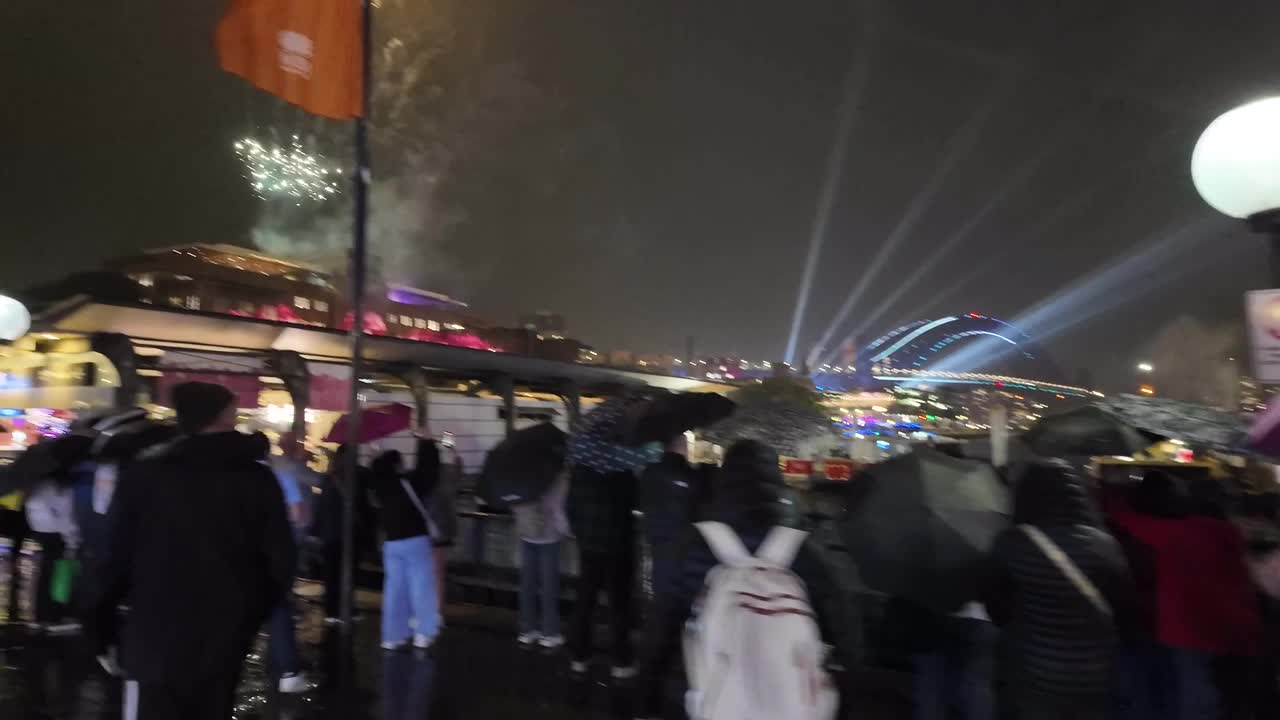 Lower crowds as rain affects Vivid Sydney opening night, Australia