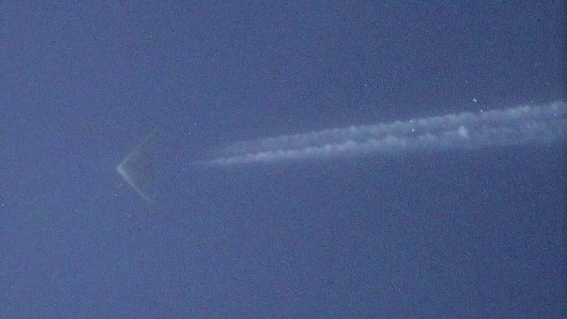 Strange airframe photographed above Nevada test range as USAF activity ...