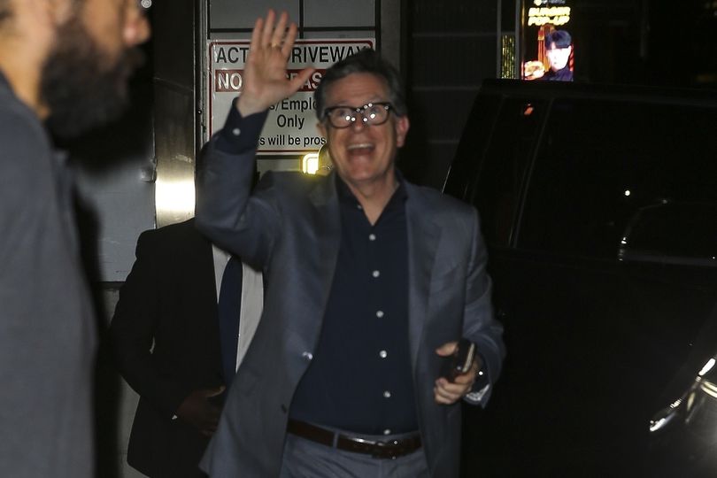 Stephen Colbert smiles as he joins guests at Late Show afterparty