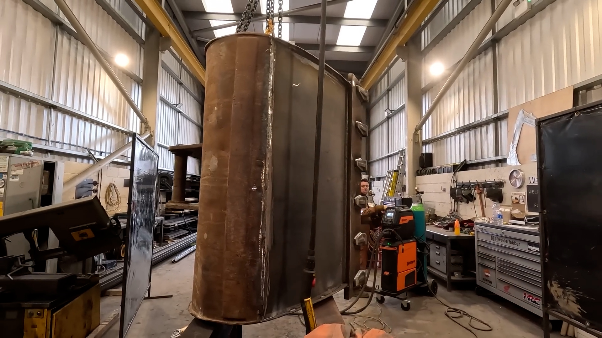 Heavy steel fabrication inside industrial welding workshop
