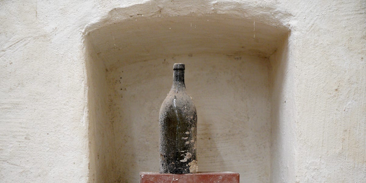 Archaeologists were examining a tomb—and found a 2,300-year-old bottle ...