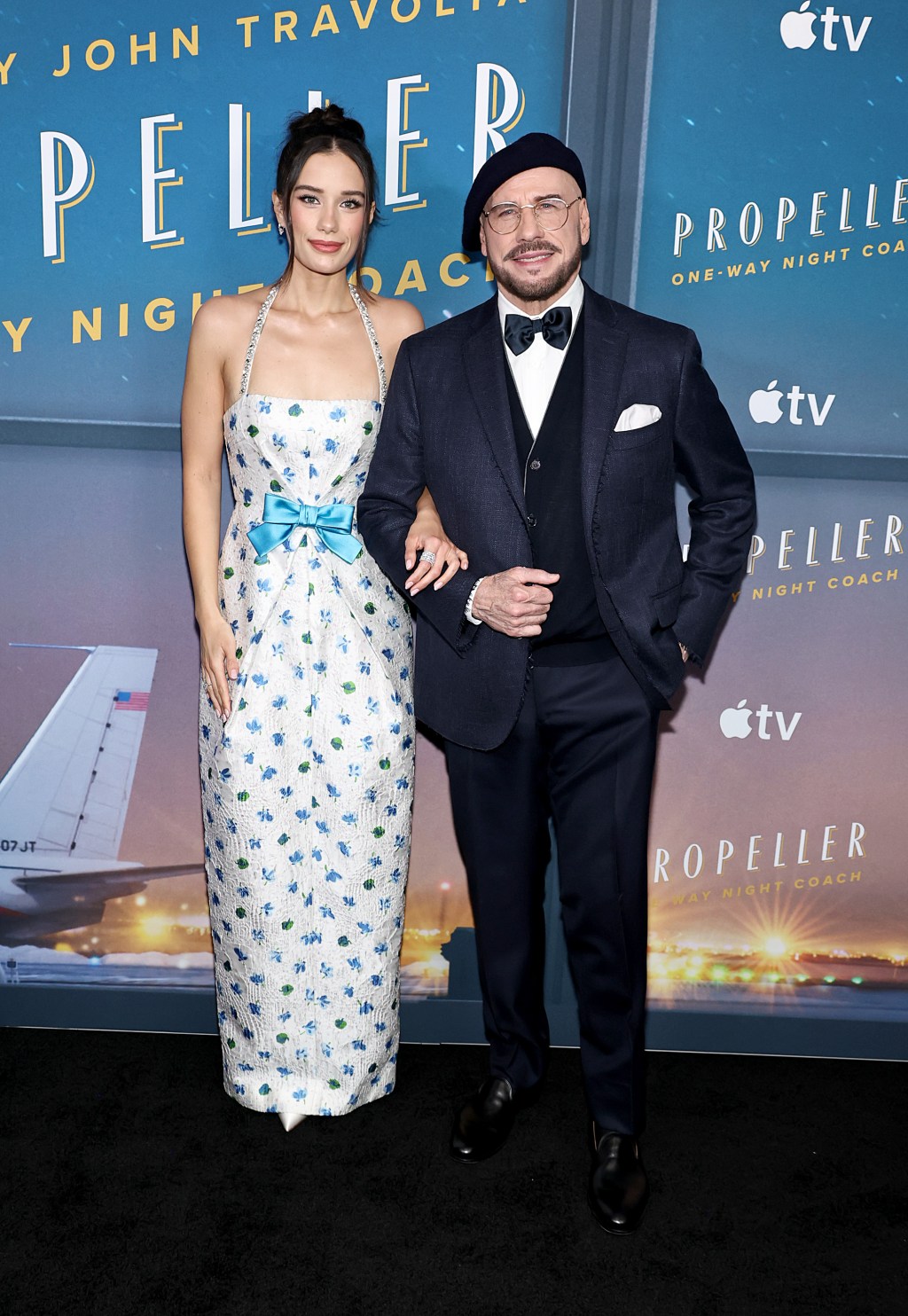 John Travolta and daughter Ella Bleu coordinate in blue at 'Propeller ...