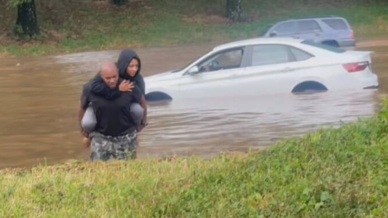 Military veteran rescues woman stranded on roof of her car in Atlanta ...