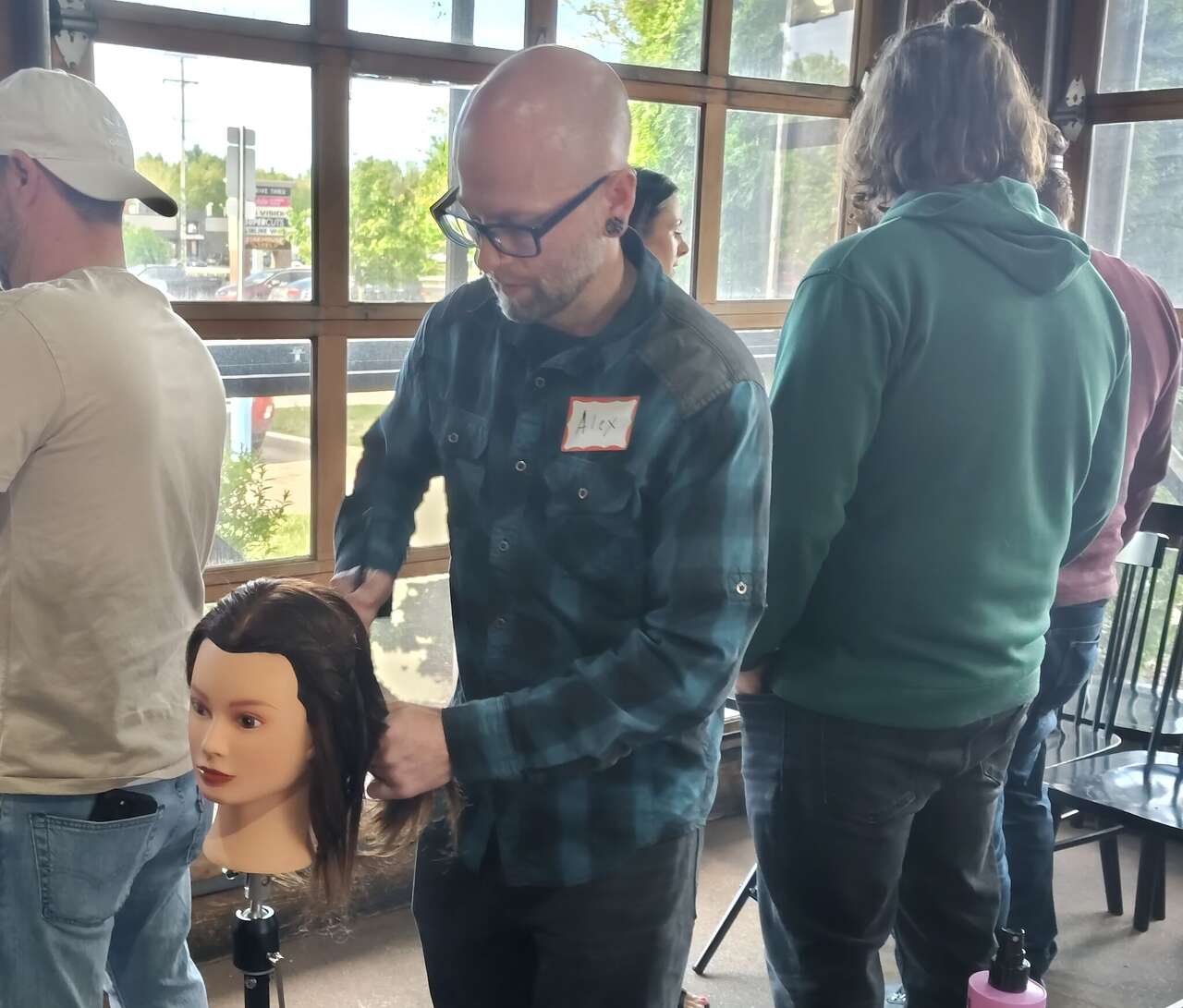 Midland dads learn to braid their daughters’ hair at Logan’s Roadhouse