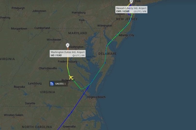 United Airlines flight in mid-air emergency as passenger tries to open door