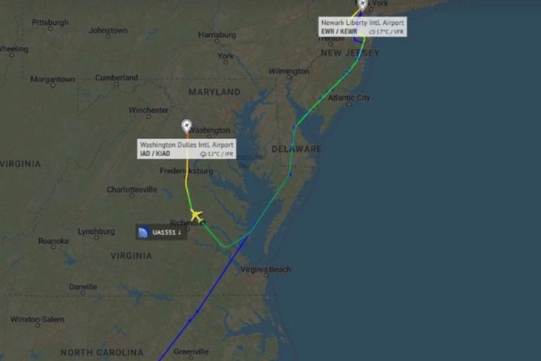 United Airlines flight in mid-air emergency as passenger tries to open door