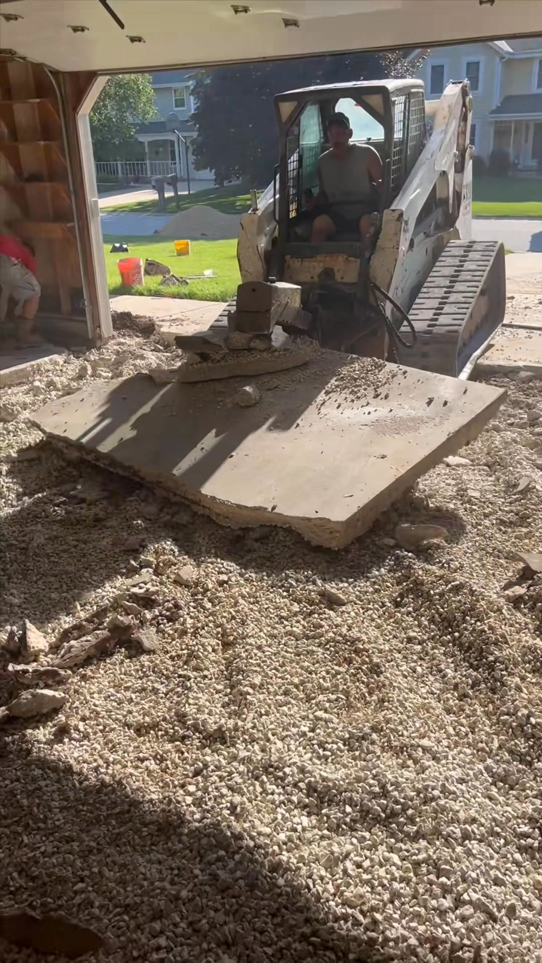 Garage floor removal by Victory Outdoor Services