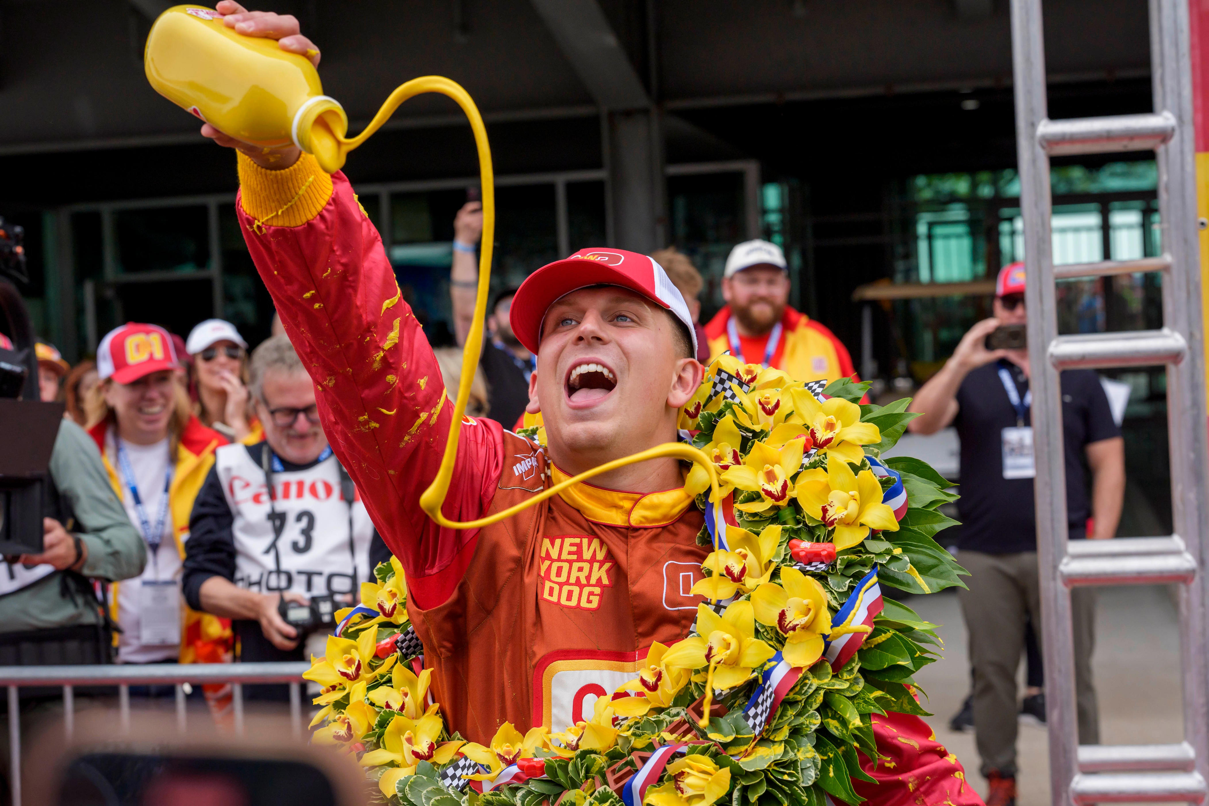 Relish these photos of Oscar Mayer Wienermobiles on the Indy 500 track ...
