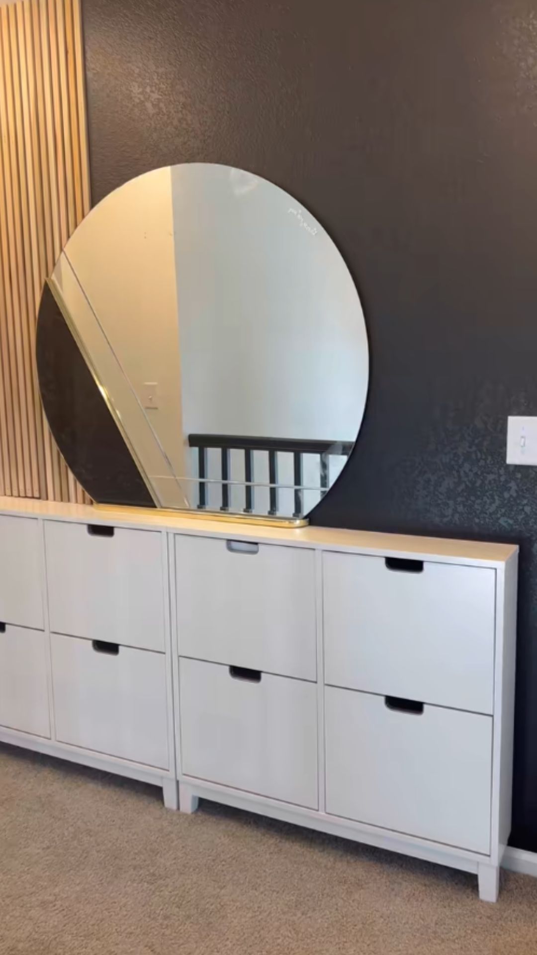 Transform your storage console with peel and stick wallpaper