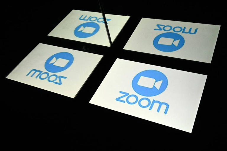 Zoom raises annual forecasts, banks on AI features to drive demand