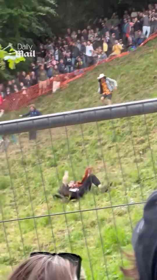 Cheese rolling racer loses control in terrifying downhill tumble