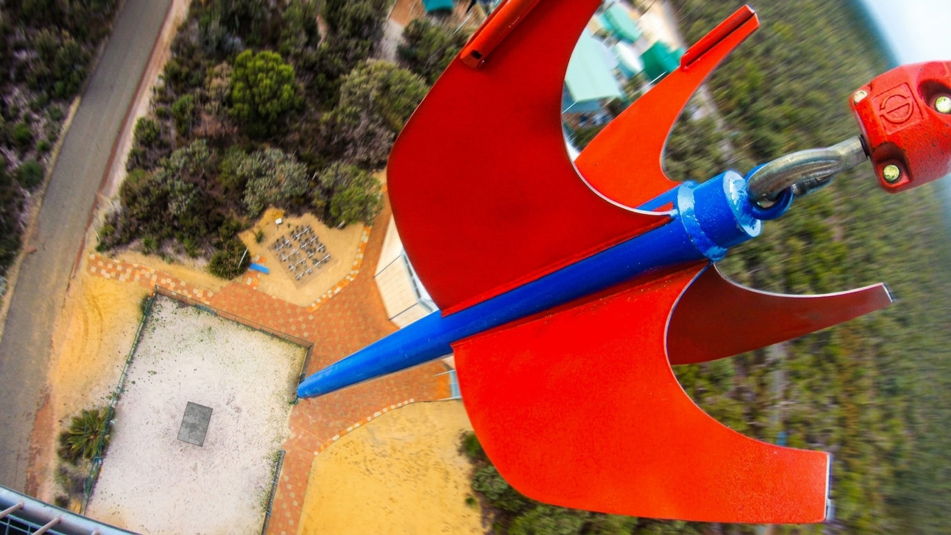 Watch what happens when a giant dart hits a 450 lb concrete block
