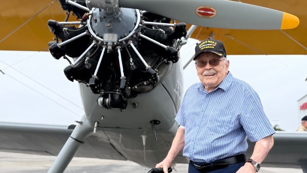 104-year-old WWII veteran takes flight again in restored aircraft in ...