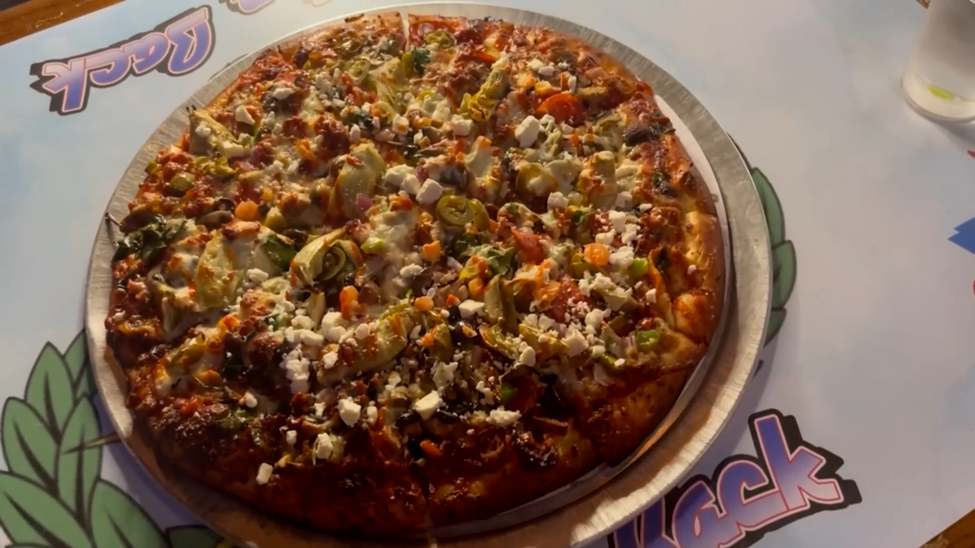 Man takes on Helen Back's brutal 20-topping pizza challenge