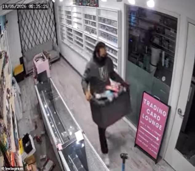 Moment burglar smashes into Pokémon trading card shop to steal $7,000 ...