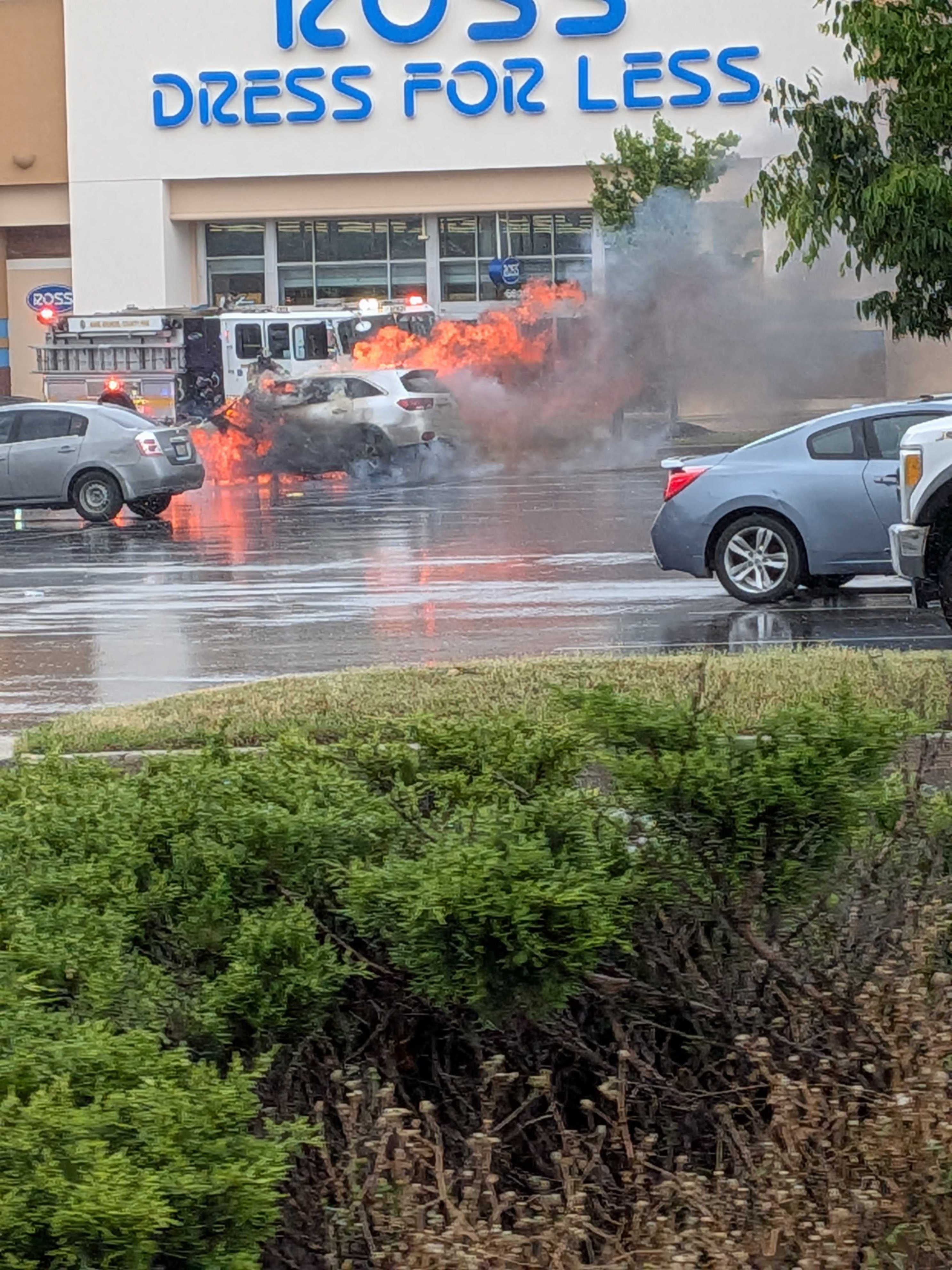 Firefighters called to fully involved vehicle fire at shopping center