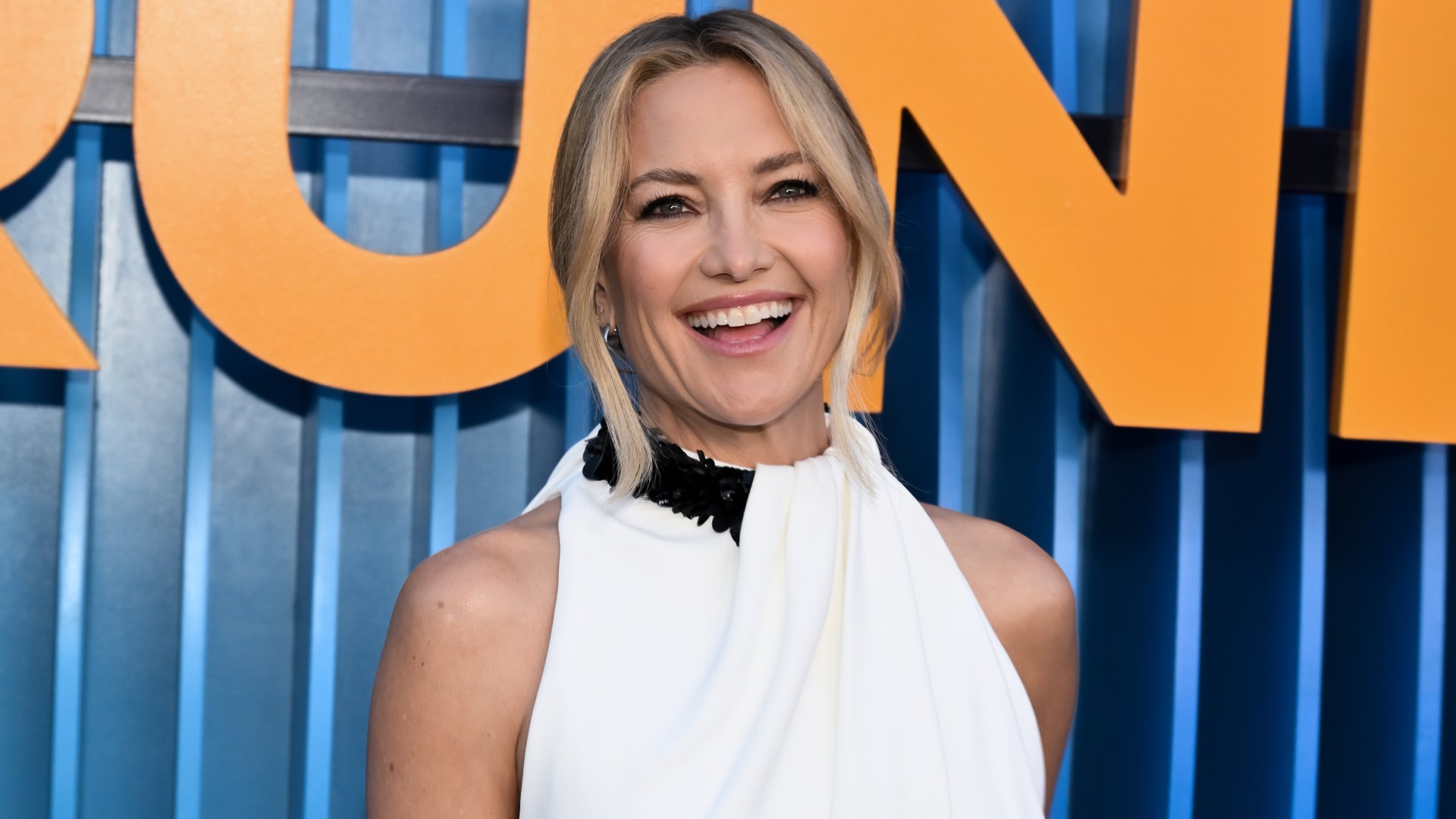 Kate Hudson's date night cami is the lacy pink top of the summer