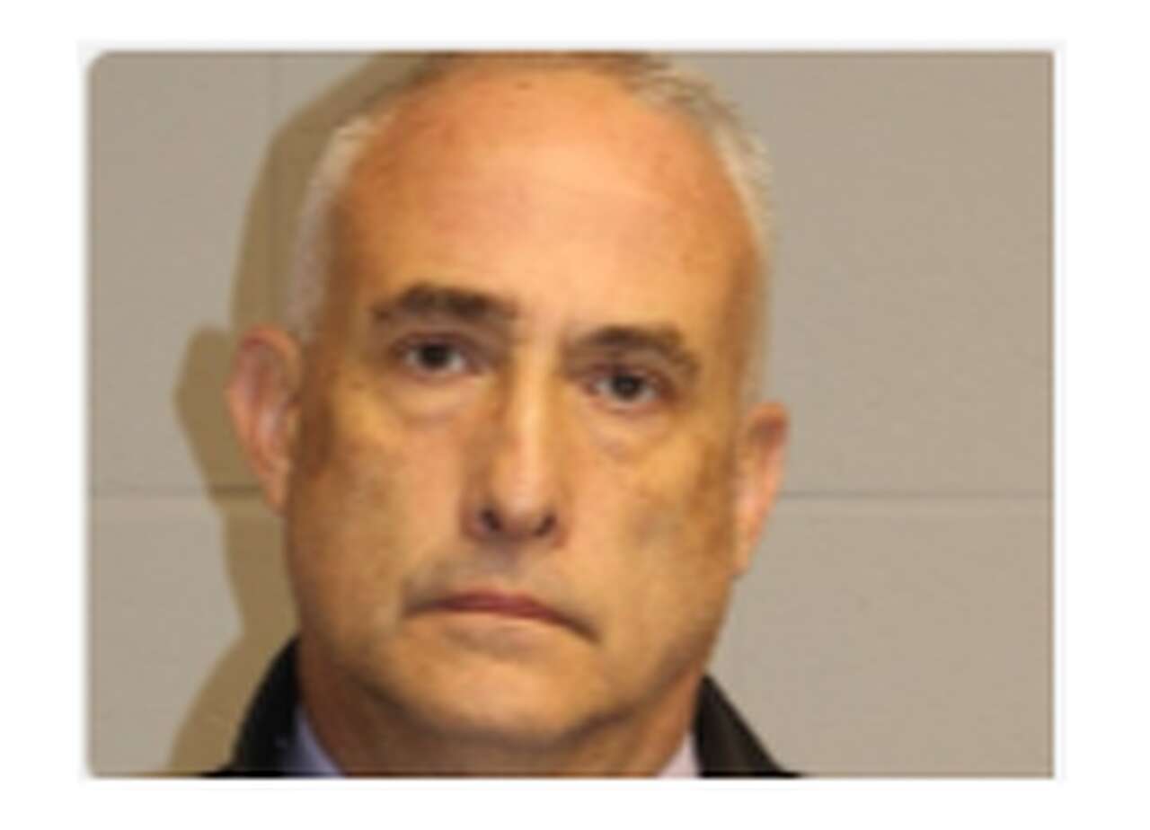 Former East Lyme chief 'aggressively' threw hot dog rolls at woman ...