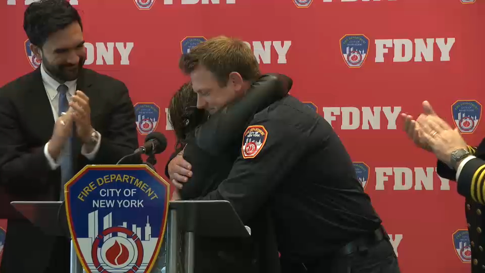 Hero firefighter reunites with woman he saved from a submerged car ...