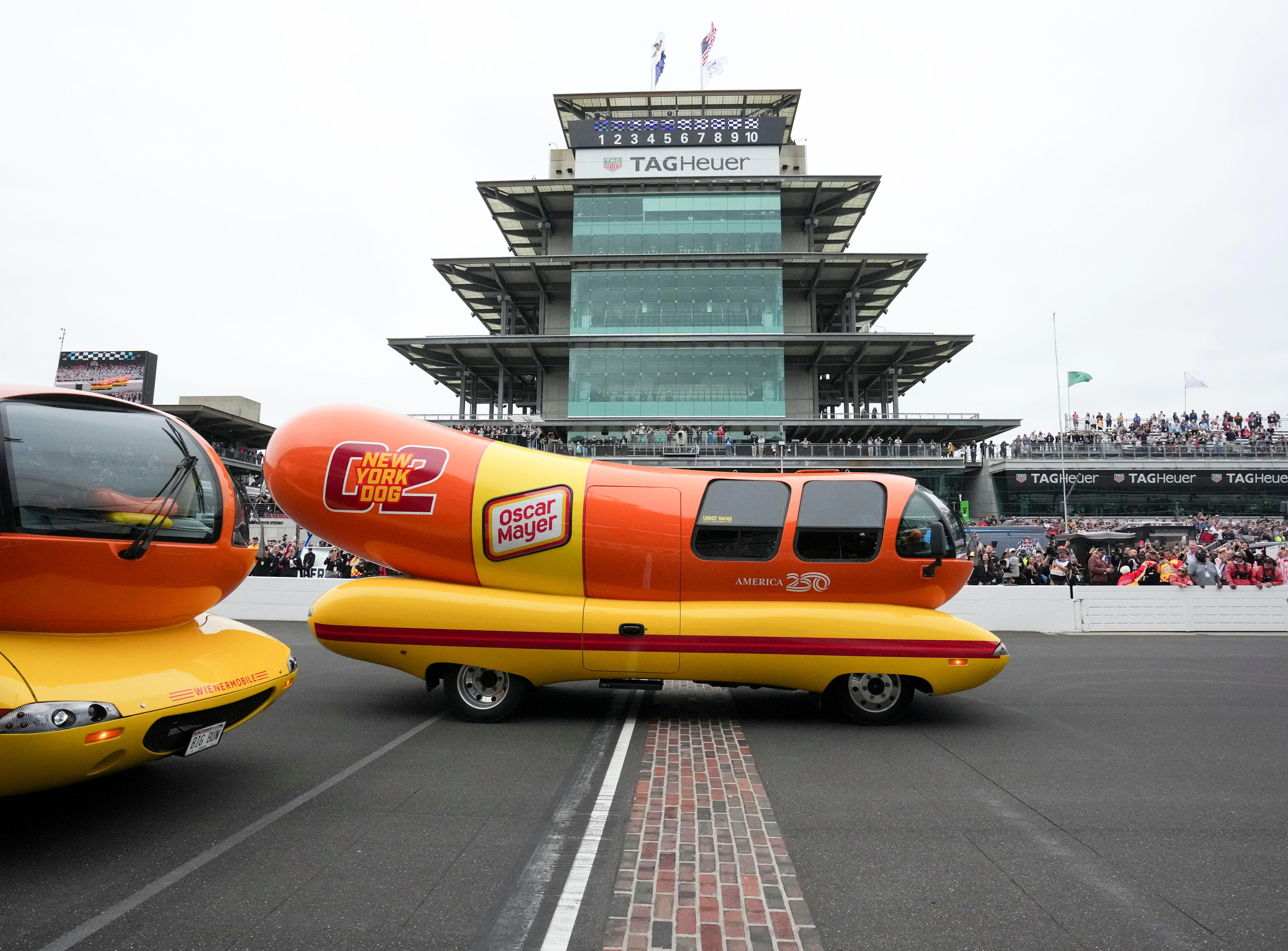 Relish these photos of Oscar Mayer Wienermobiles on the Indy 500 track ...