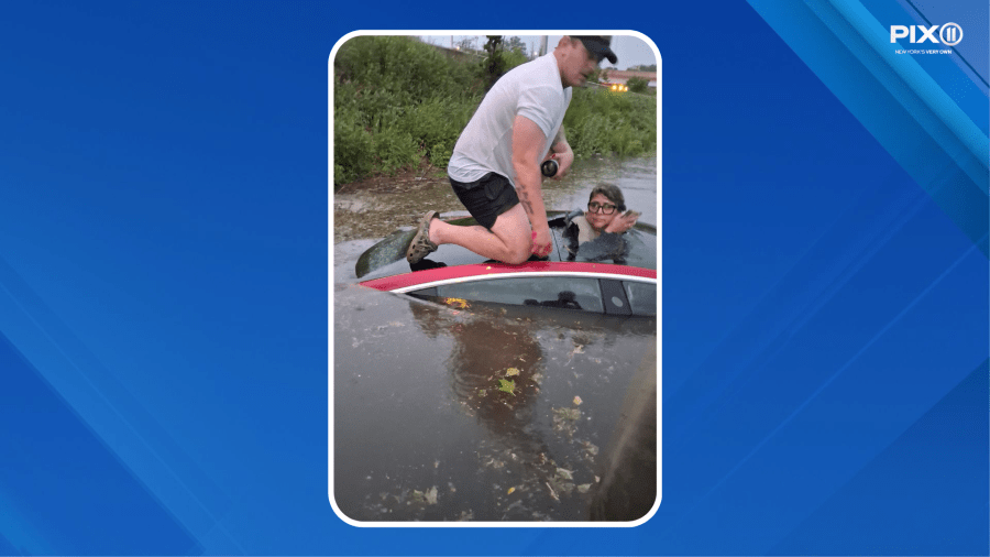 FDNY firefighter rescues principal from flooded car in Queens: 'Superhero'