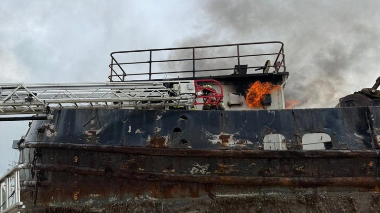 Firefighters extinguish boat fire near Jarrett Bay Boatworks in Beaufort