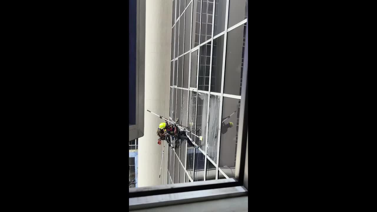 Window cleaning on high-rise in Malaysia shocks onlooker