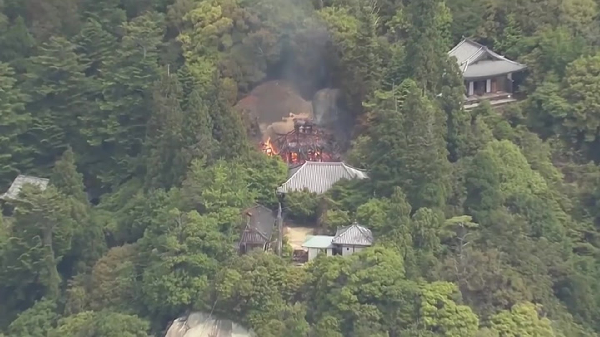Buddhist hall housing 'eternal flame' burns down in Japan