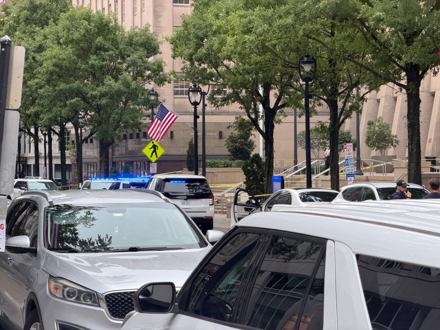 Woman shoots her attorneys outside courthouse, North Carolina police say