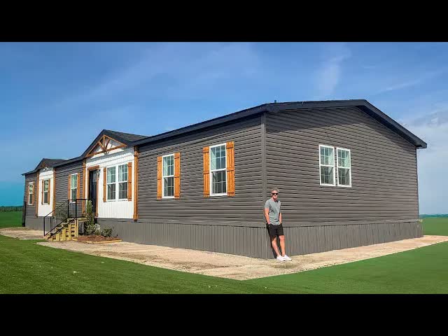 Inside the farmhouse style prefab home with 4 bedrooms!